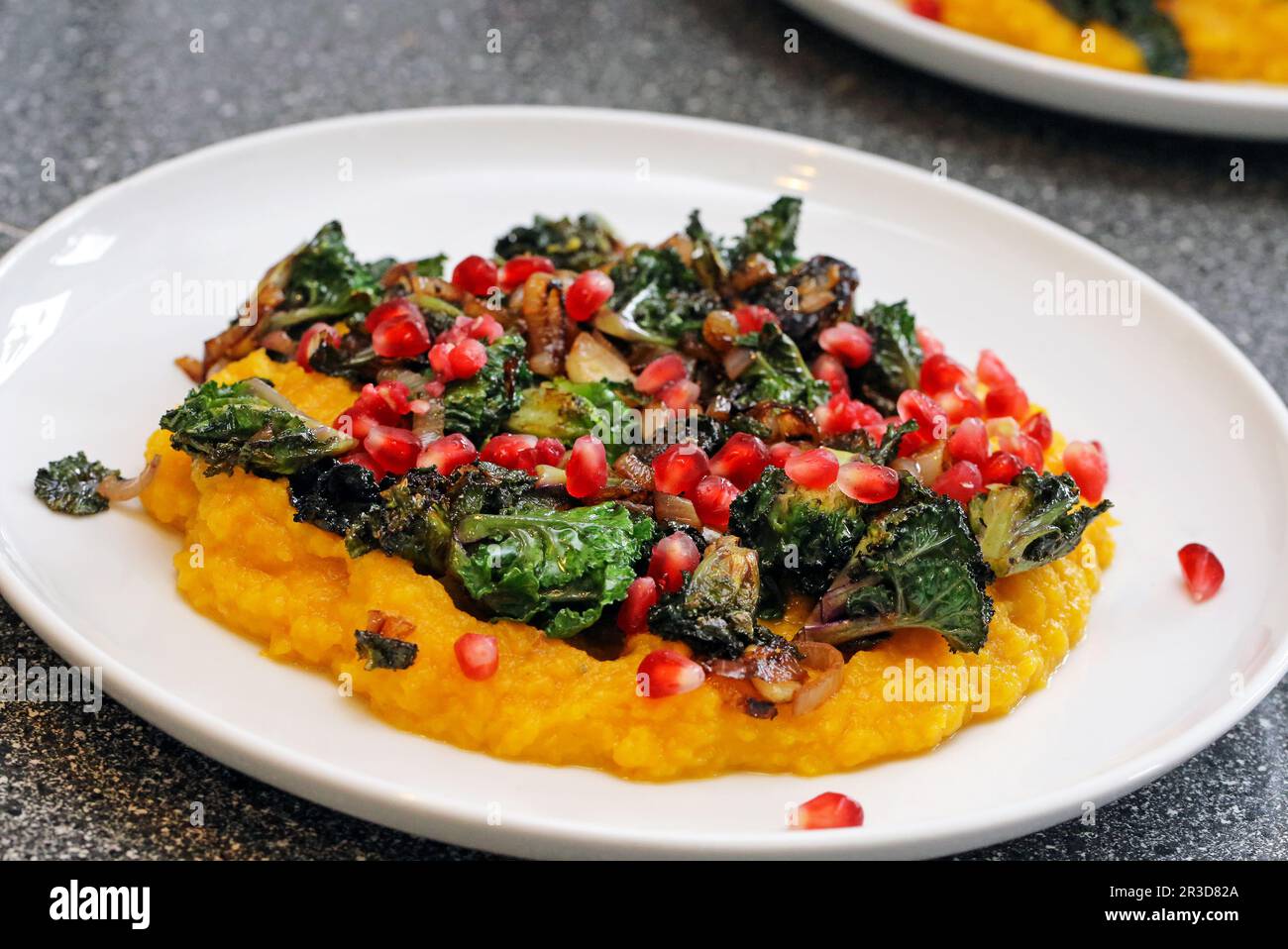 Fried kalettes on pumpkin puree Stock Photo - Alamy