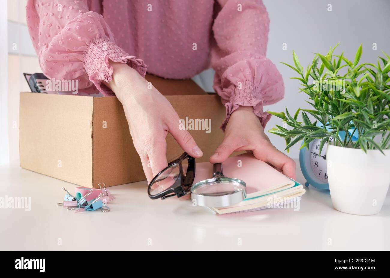 Putting things in hi-res stock photography and images - Alamy