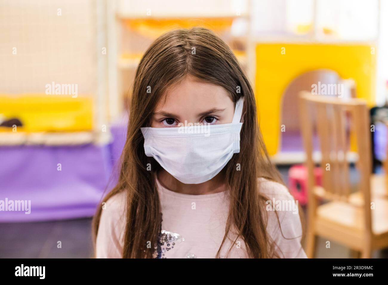 Safety measures allow play center entry only in masks Stock Photo - Alamy