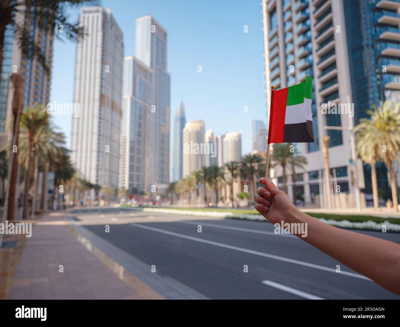 Uae flag hand hi-res stock photography and images - Alamy