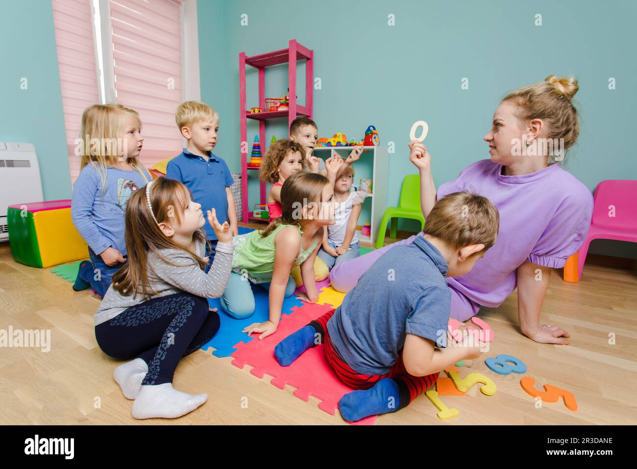 Preschool classroom sitting floor hi-res stock photography and images ...