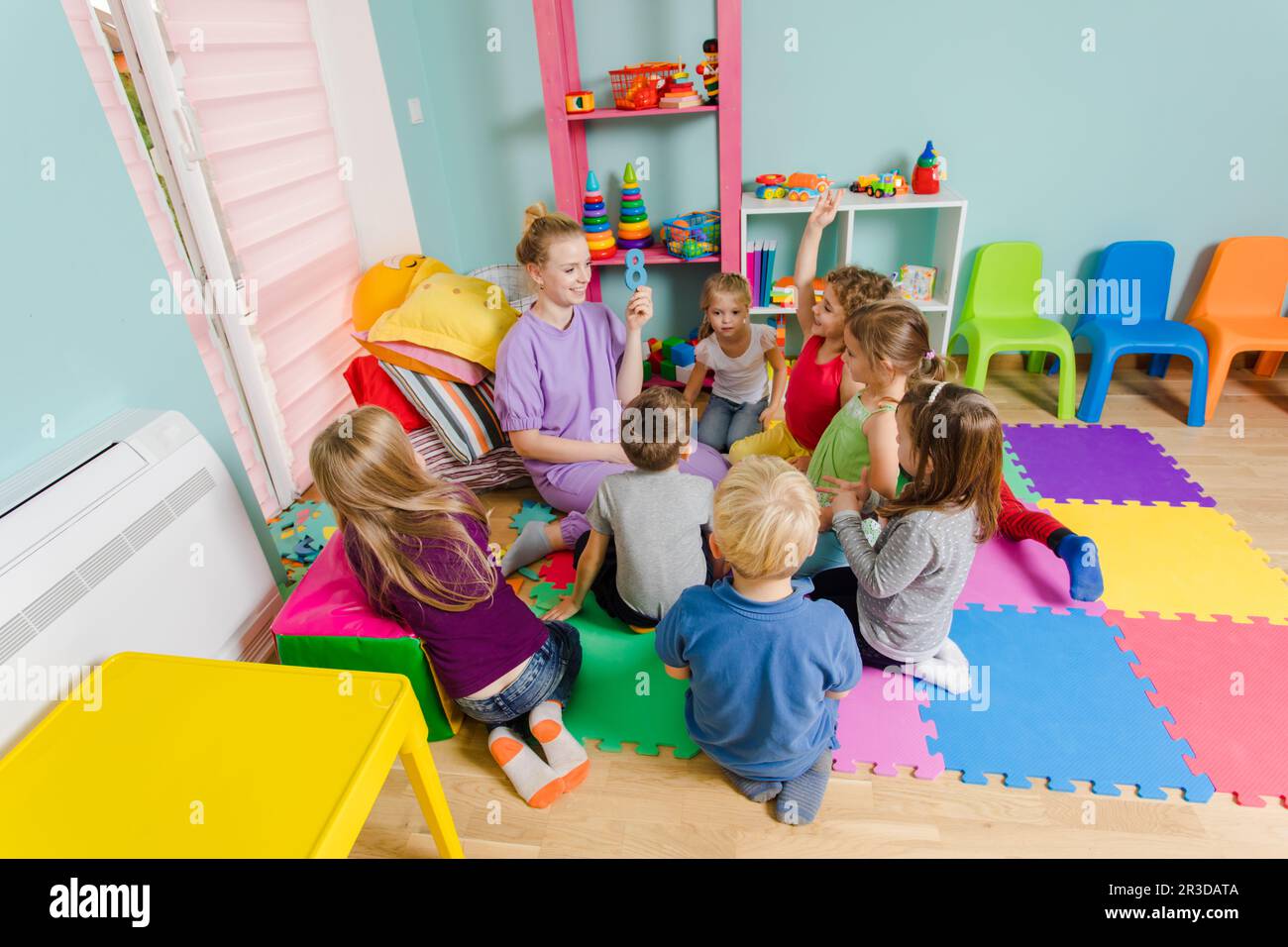 Preschool classroom sitting floor hi-res stock photography and images ...