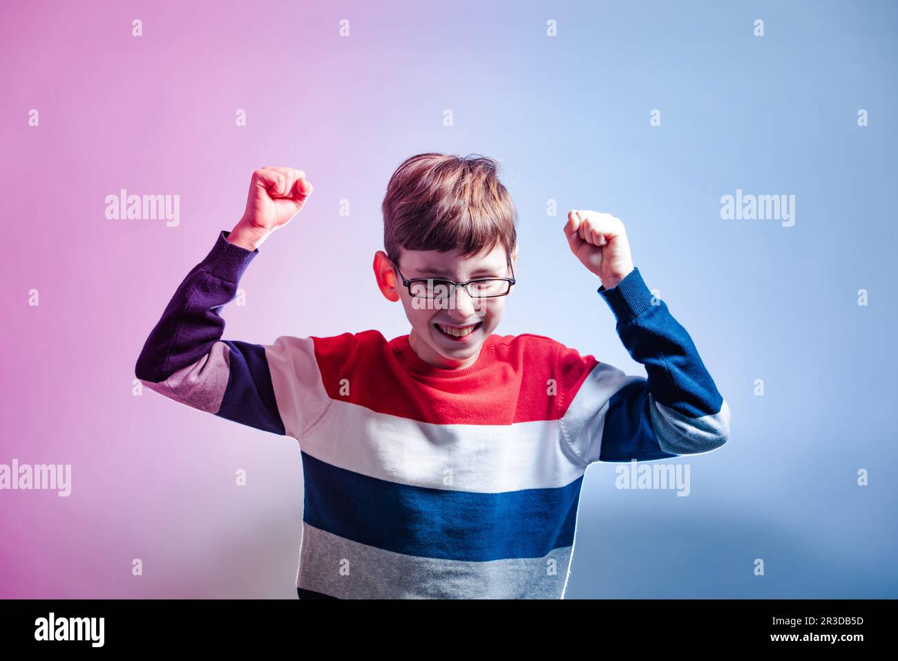 The little boy is demonstrating his strong and expresses emotion Stock ...