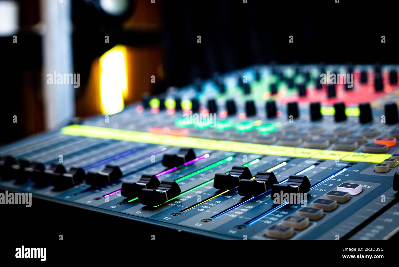 Sliders and buttons on Audio Mixing Desk at live event Stock Photo - Alamy