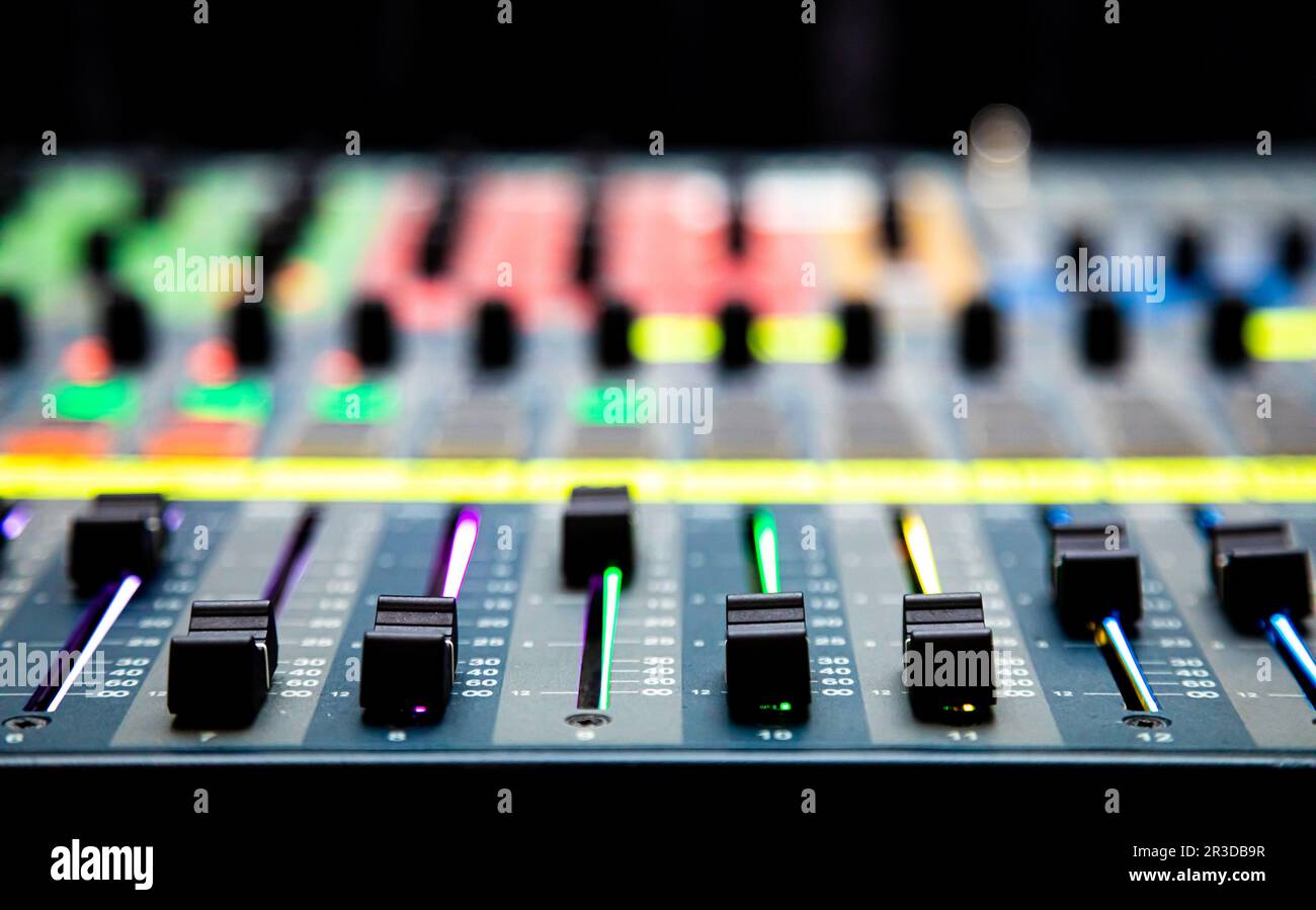 Sliders and buttons on Audio Mixing Desk at live event Stock Photo - Alamy