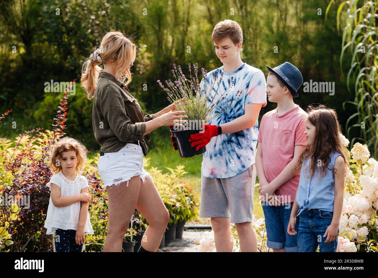 Kids choose present for the mother's day Stock Photo - Alamy