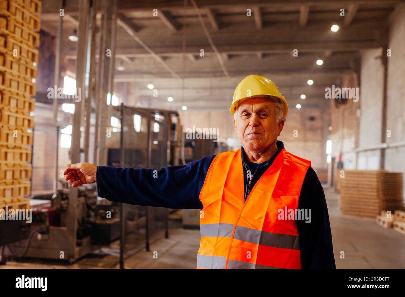 Old man in hard hat hi-res stock photography and images - Alamy