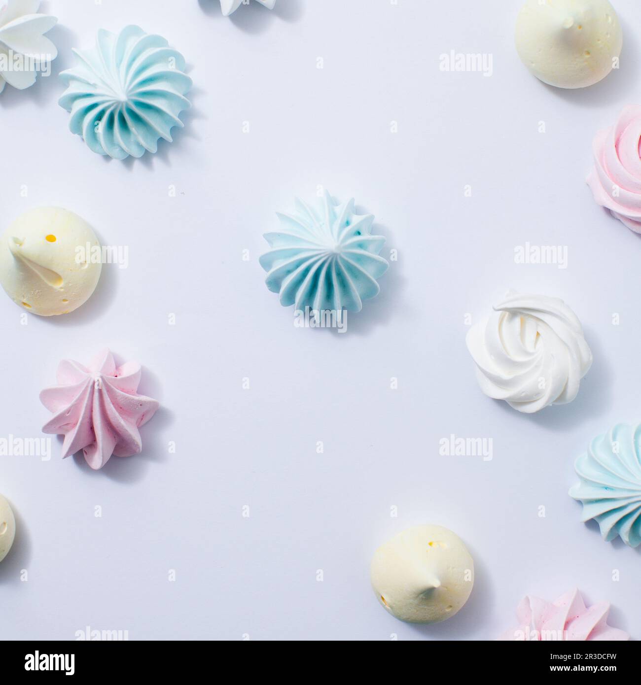 Assortment of small colorful meringue cookies on white Stock Photo - Alamy