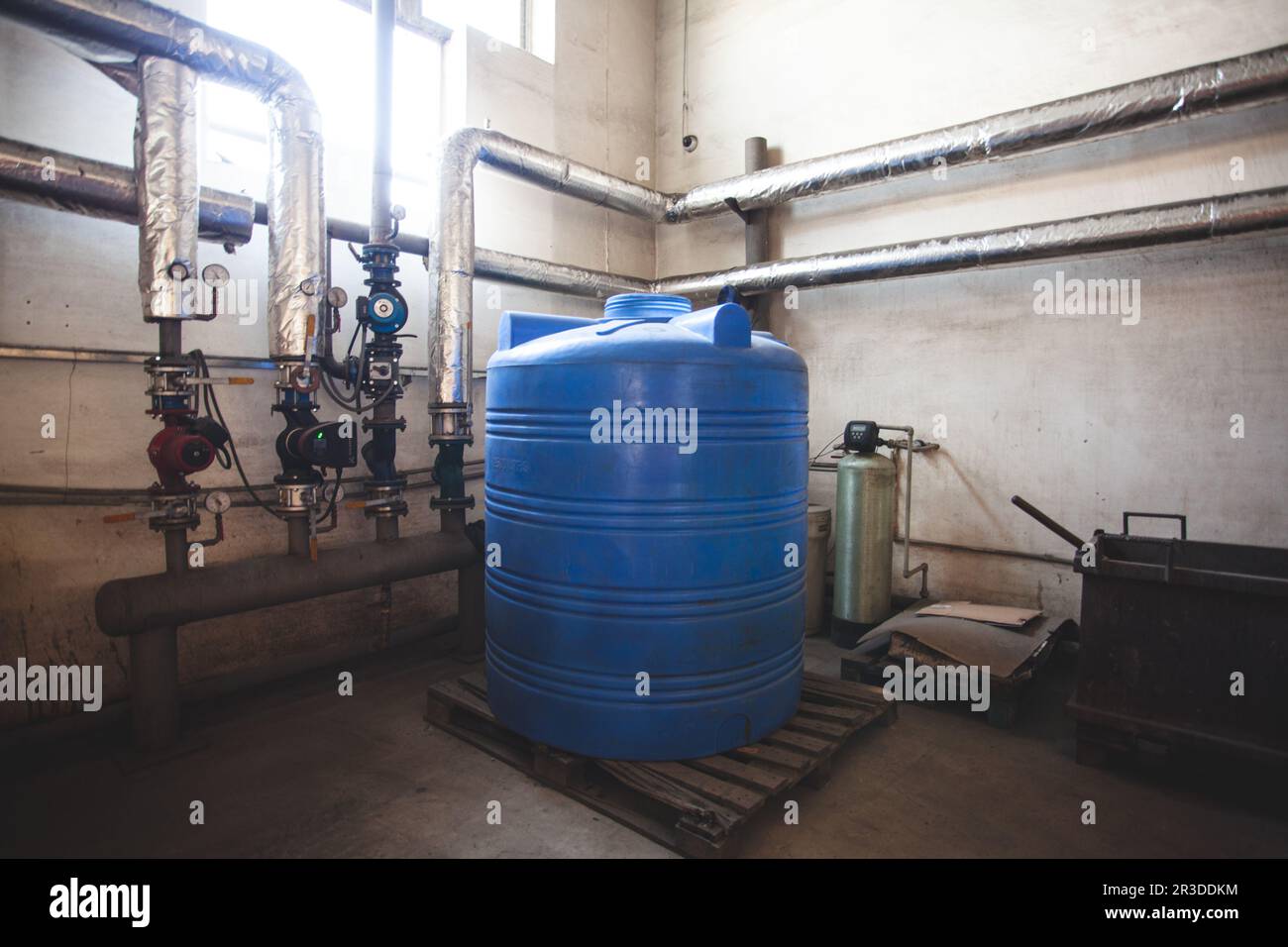 The large blue water barrel in boiler room at the enterprise Stock ...