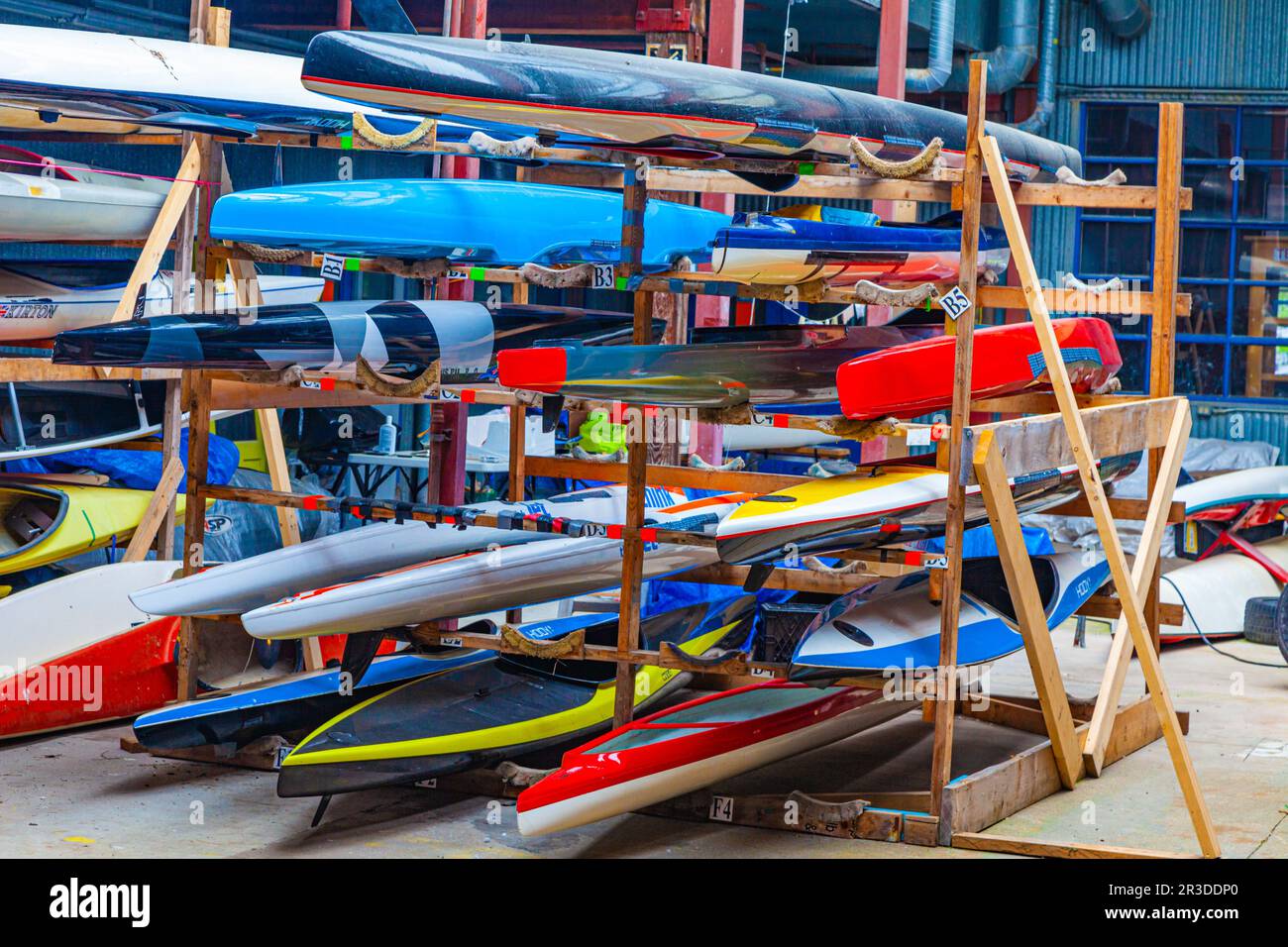 Kayak and racing canoe shells in dry storage on Granville Island ...