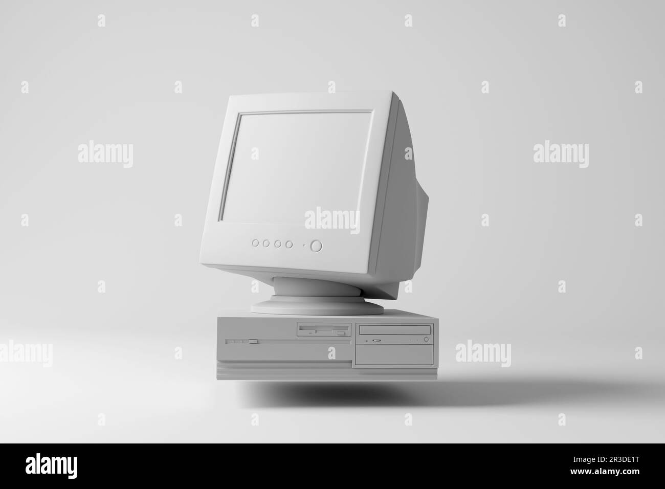 White retro style computer floating in mid air casting shadow on white background in greyscale ...