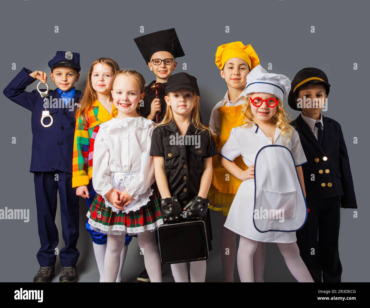 Little kids dressing up as professions. Future education Stock Photo ...