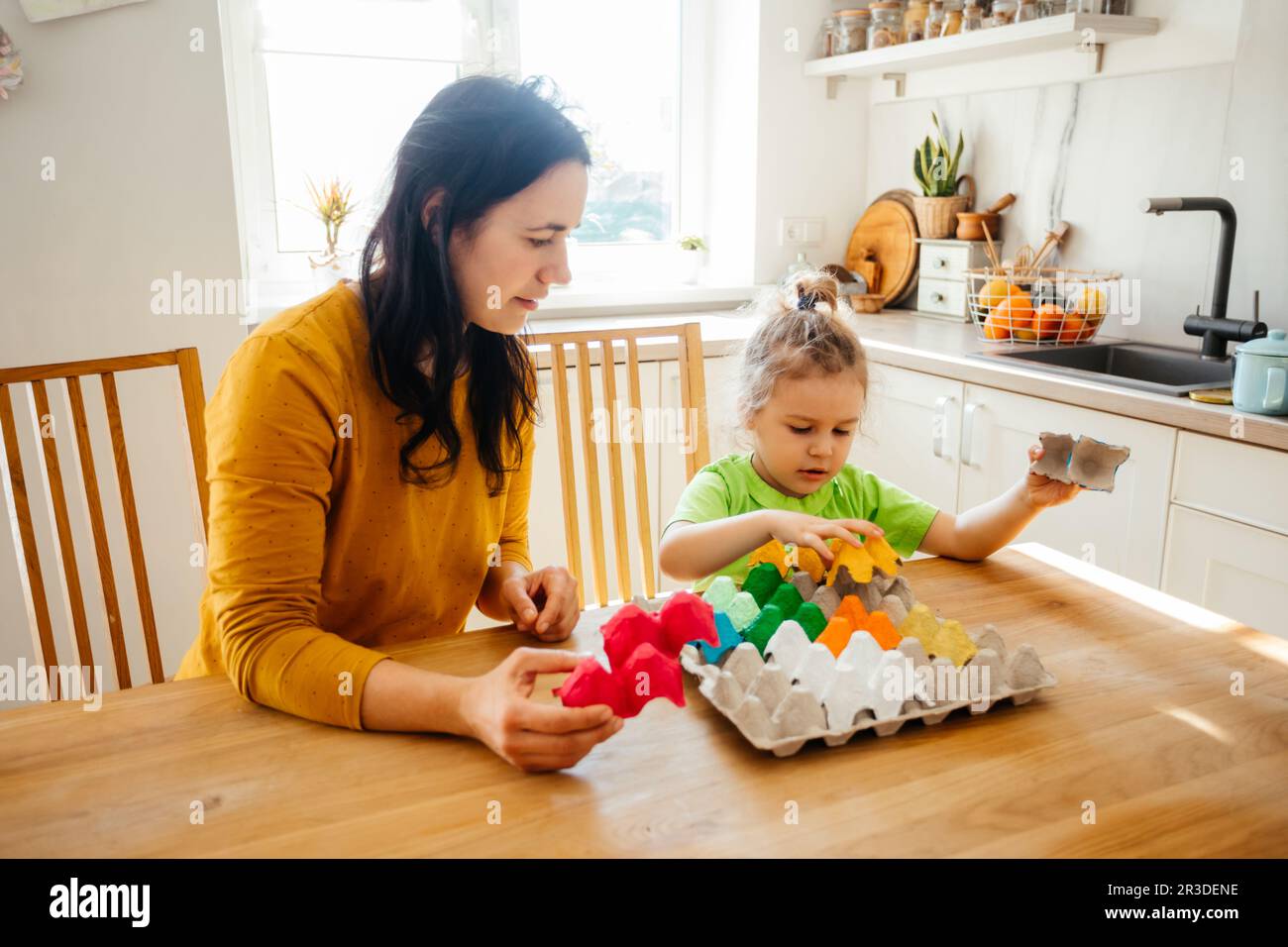 Educating kids and preparing them for school at home Stock Photo - Alamy