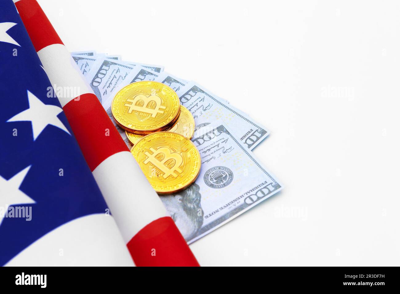 Bitcoin physical coins on American flag background with dollars Stock ...