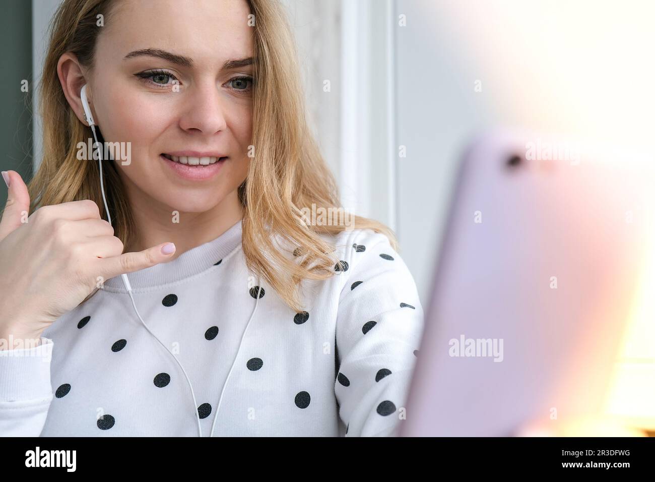 Beautiful blonde woman taking selfie hi-res stock photography and ...