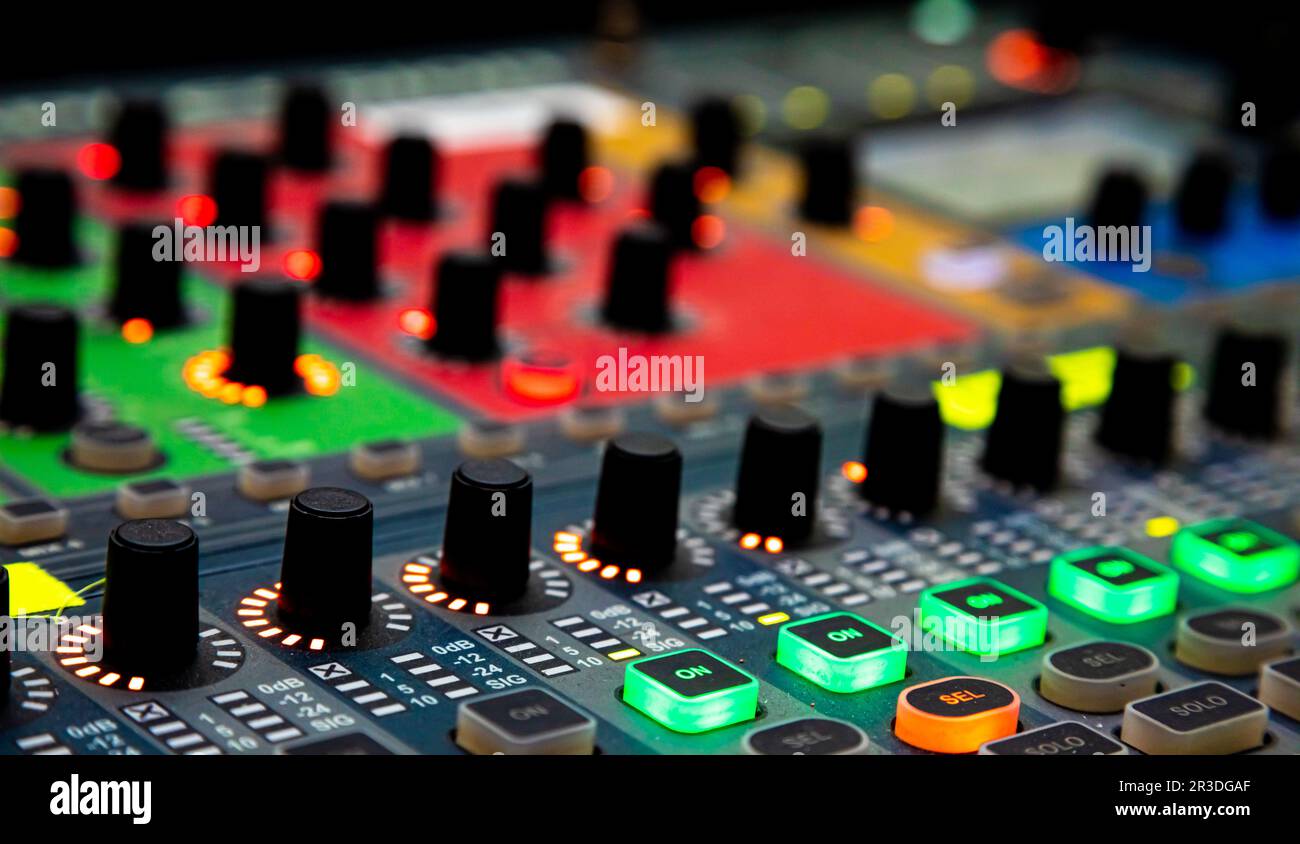 Sliders and buttons on Audio Mixing Desk at live event Stock Photo - Alamy