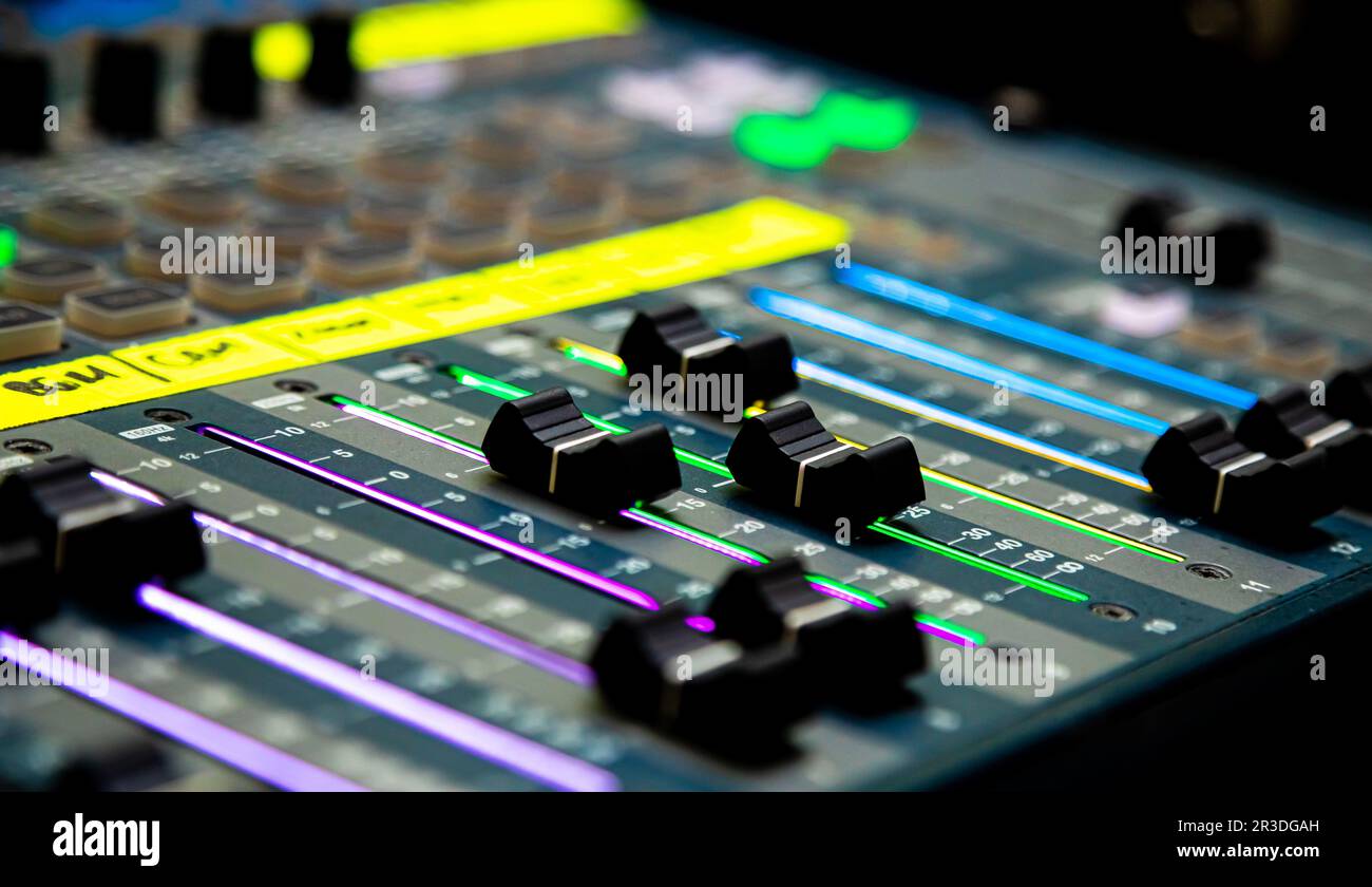 Sliders and buttons on Audio Mixing Desk at live event Stock Photo - Alamy