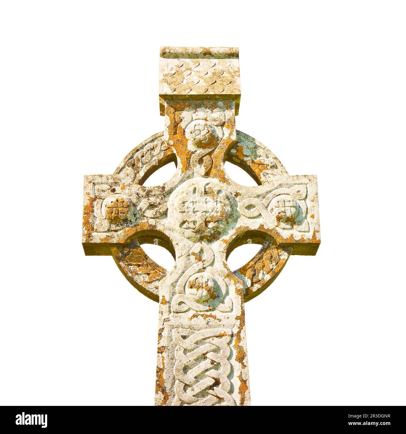 Celtic carved stone cross against a white background for easy selection ...