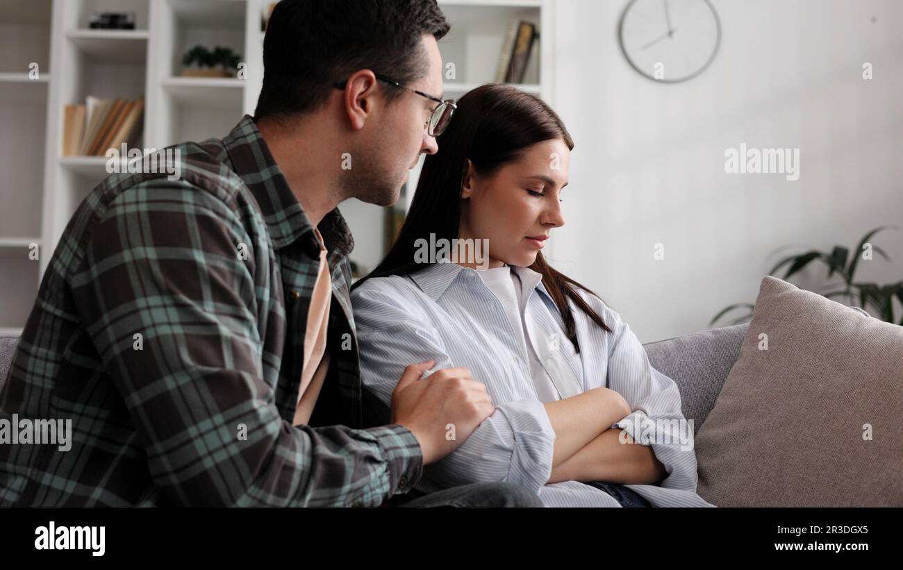 A sympathetic young man provides psychological support to a thoughtful ...