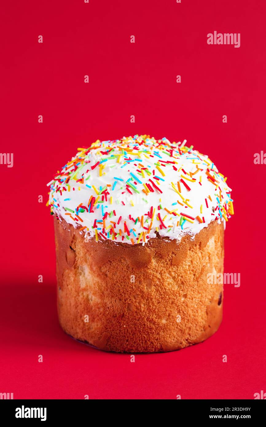 Easter Cake - Russian and Ukrainian Traditional Kulich on a bright red ...