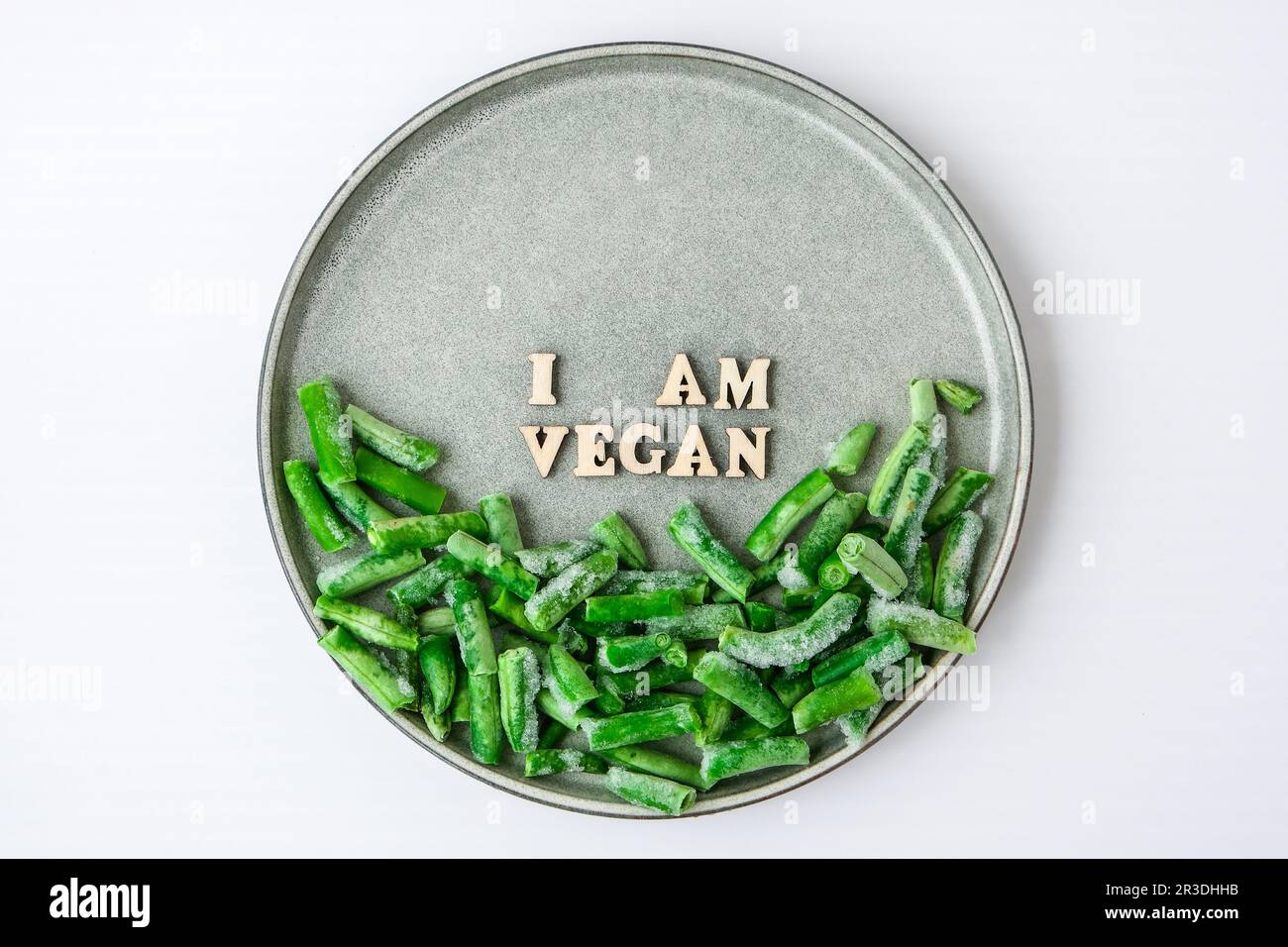 I AM VEGAN text in plate. Veganism, vegetarian healthy lifestyle ...
