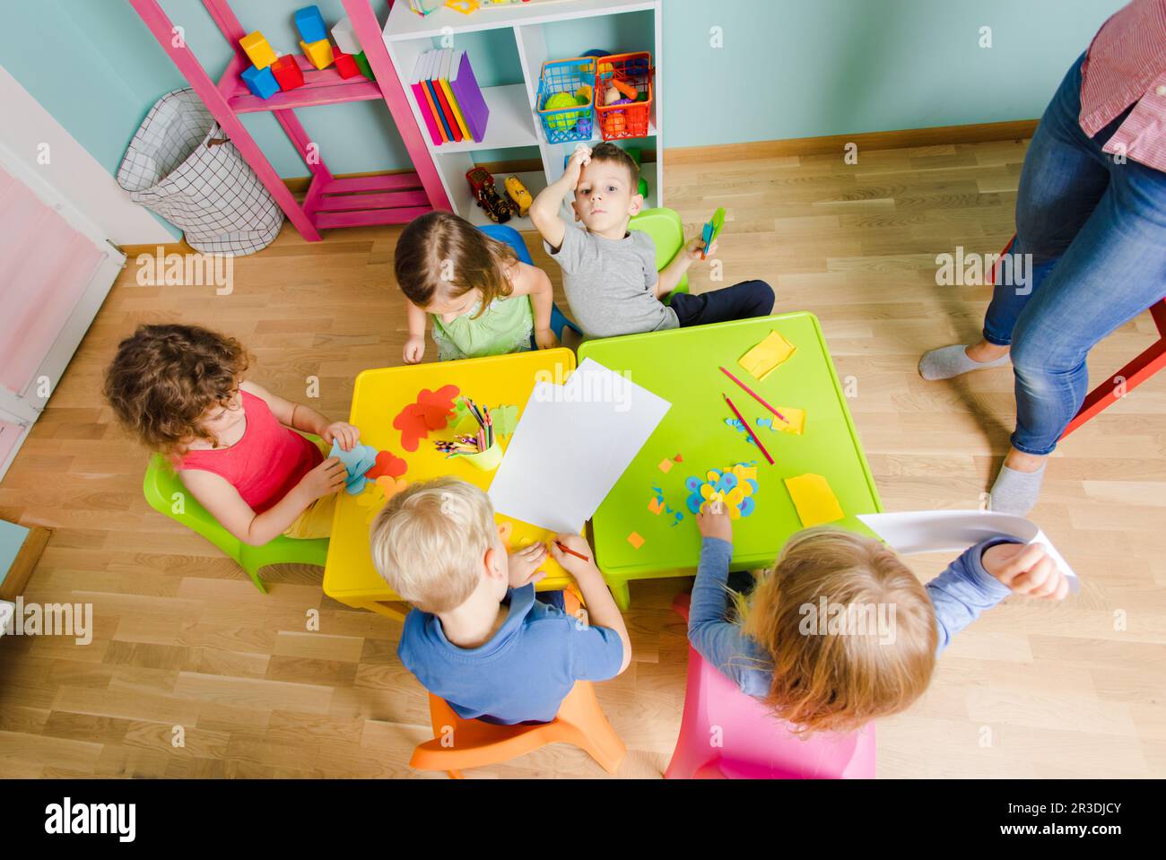 Top view kindergarten children during art lesson Stock Photo - Alamy
