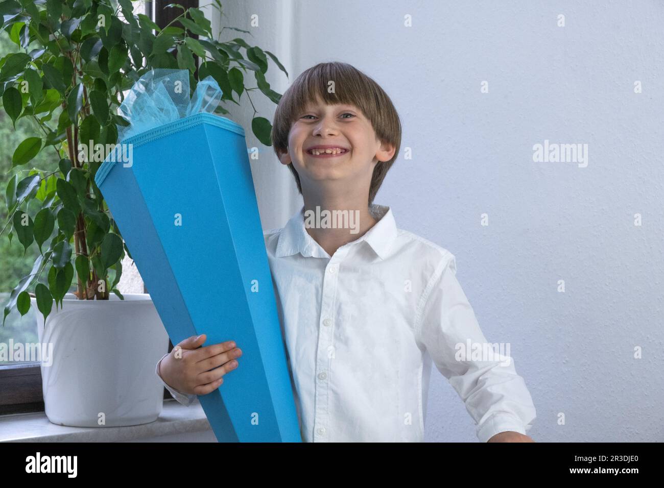 Children with traditional German candy cone on the first day of school ...