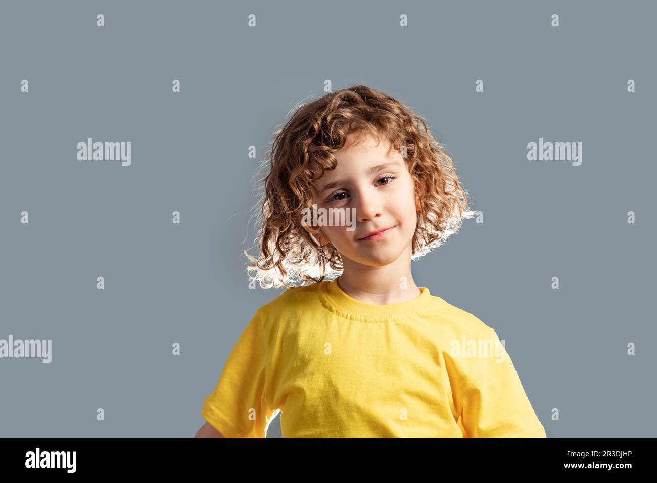 Child in yellow shirt hi-res stock photography and images - Alamy