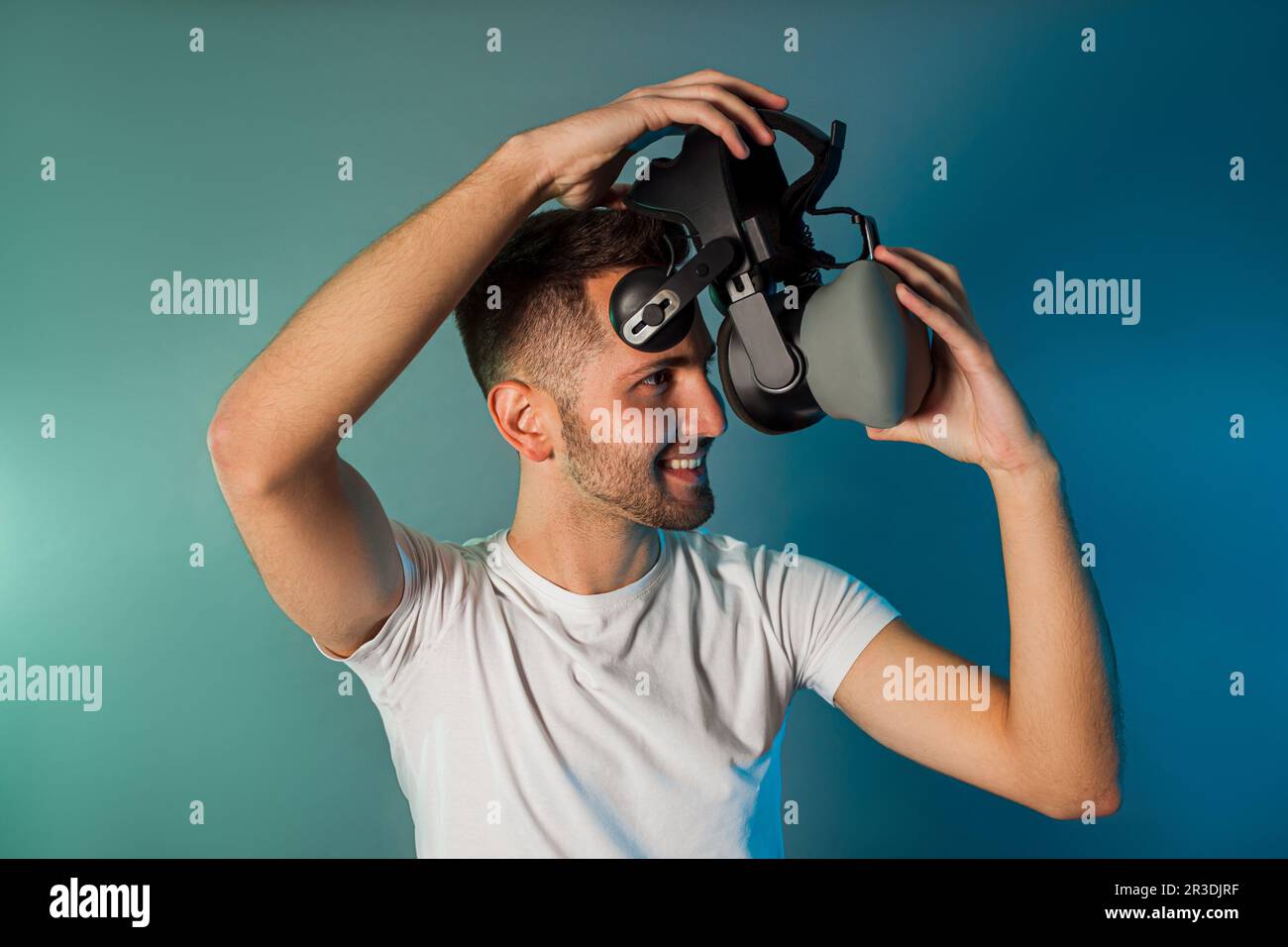 Man using gaming gadget hi-res stock photography and images - Alamy