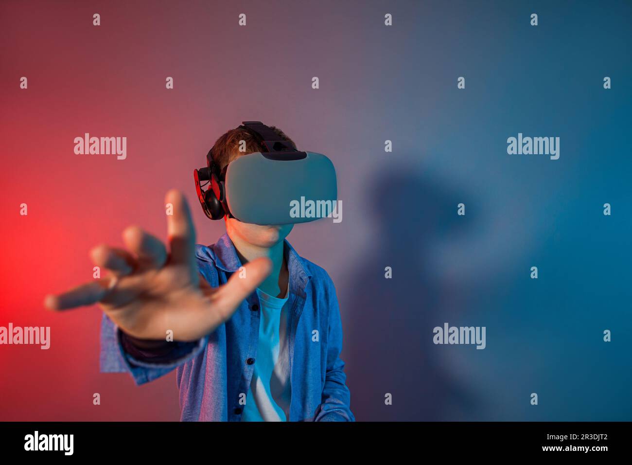 Boy using gaming gadget hi-res stock photography and images - Alamy