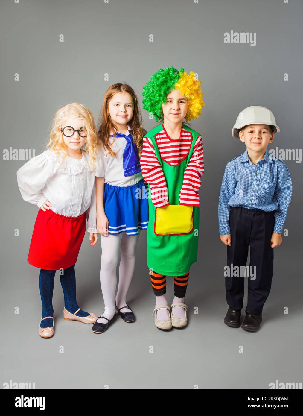 The joyful children in a different professions costumes Stock Photo - Alamy