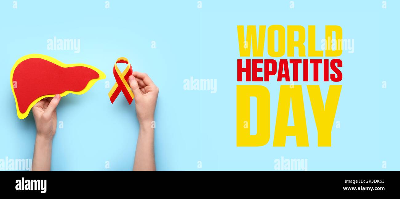 Hands with awareness ribbon and paper liver on light blue background ...