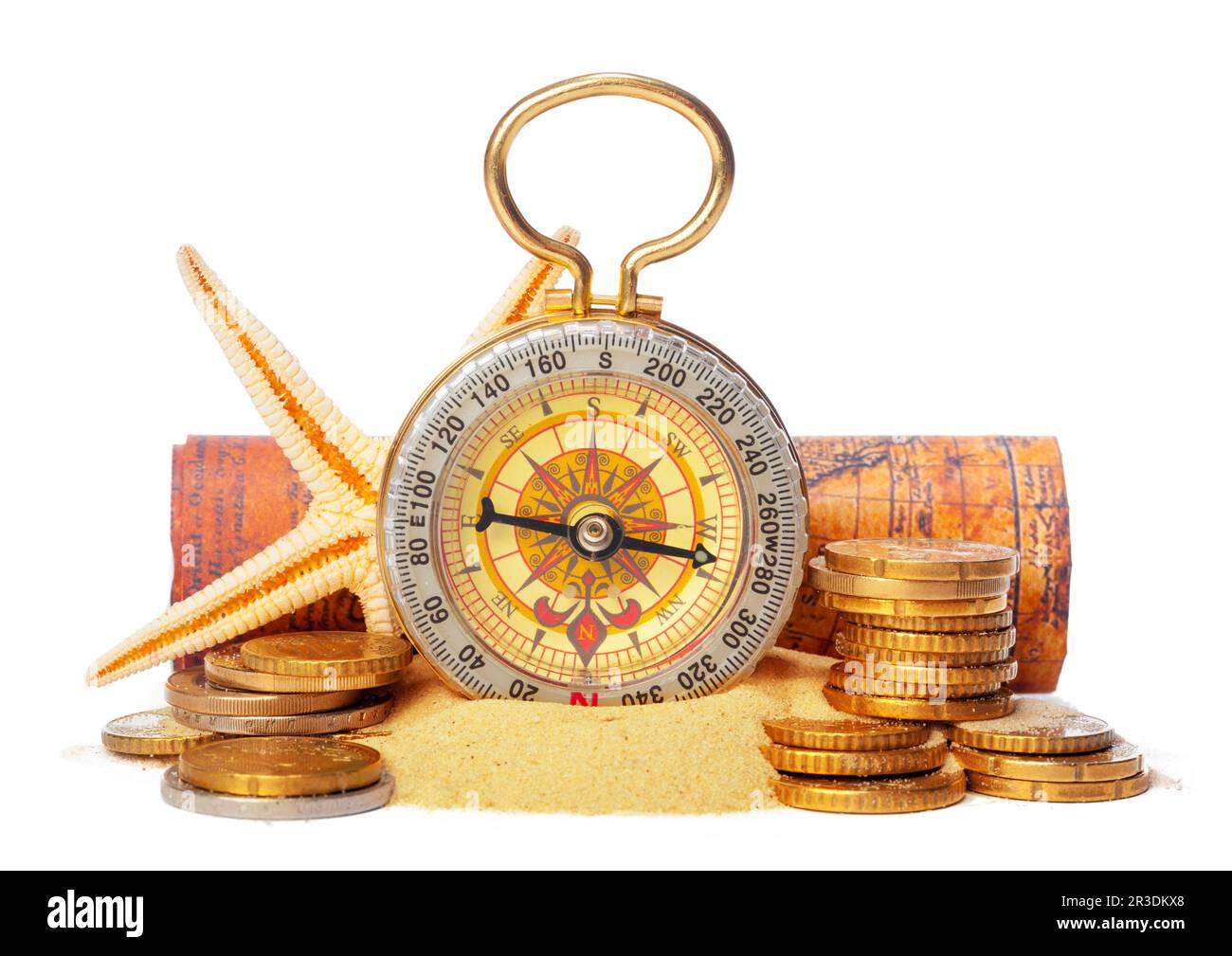 stacking coins with compass .money saving concept Stock Photo - Alamy