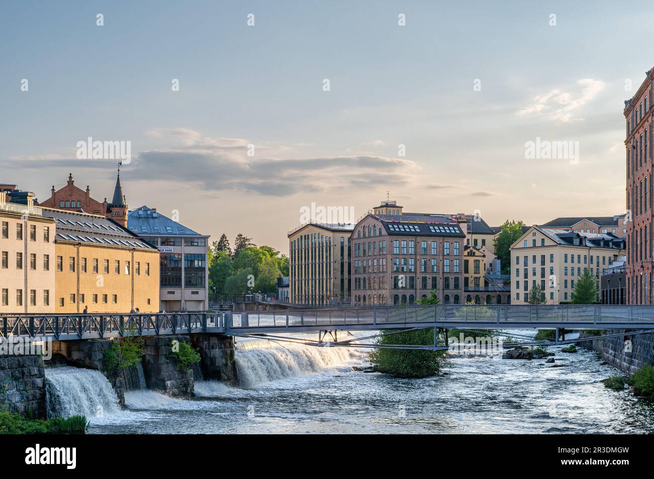 The old industrial landscape and Motala river on a spring evening in ...