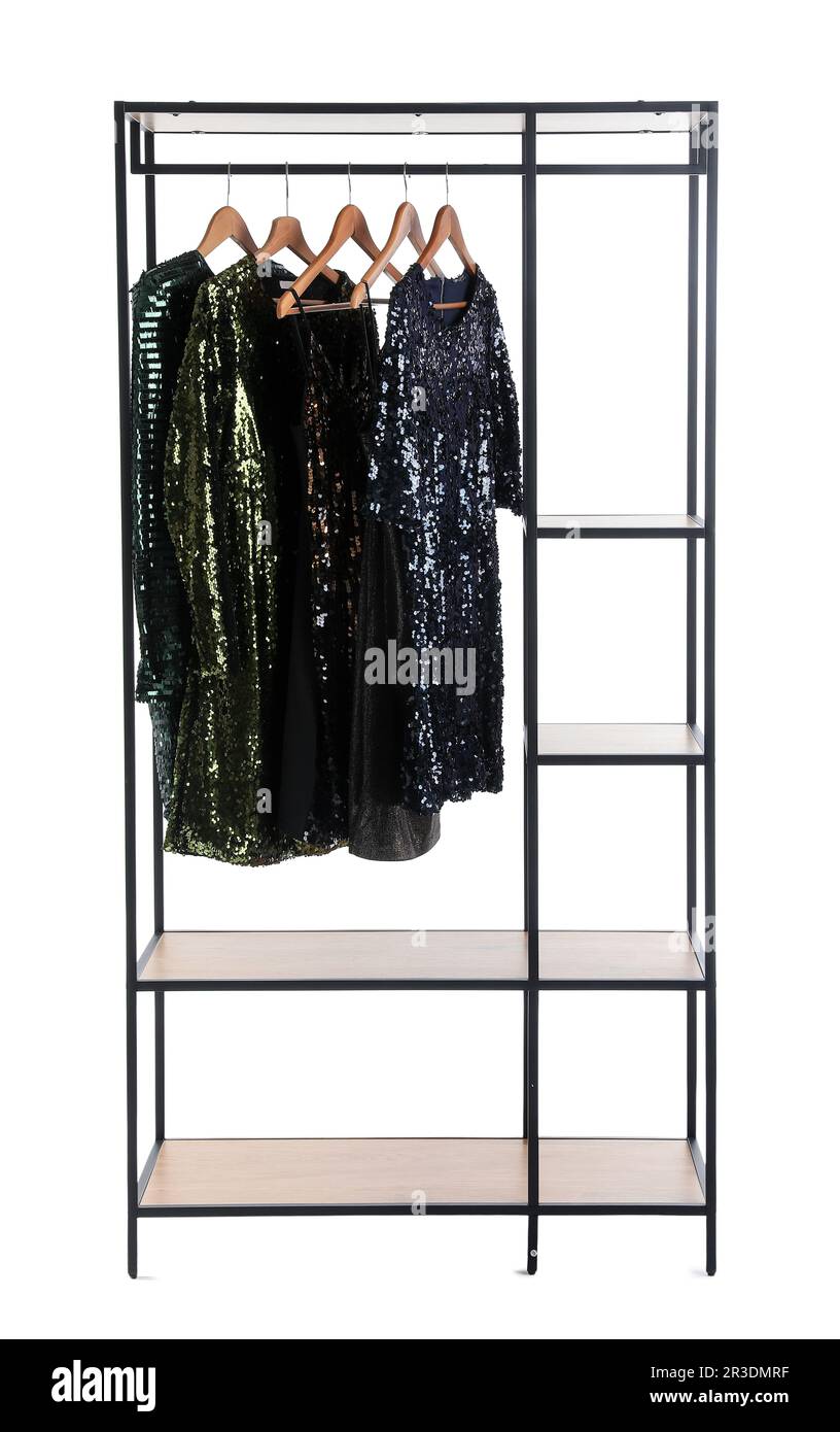 Shelving unit with dresses on white background Stock Photo - Alamy