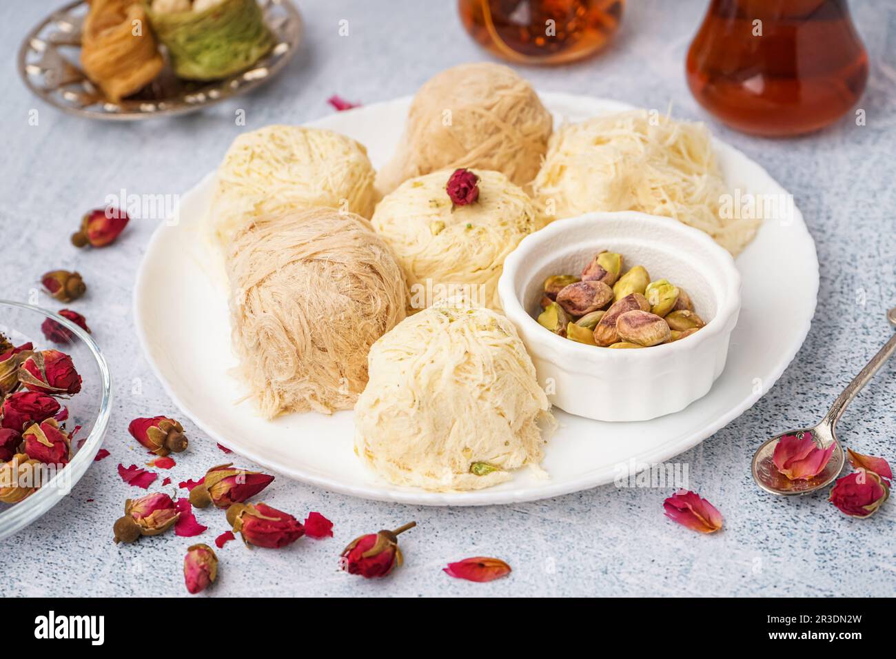 Plate with tasty Turkish Pismaniye on light background Stock Photo - Alamy