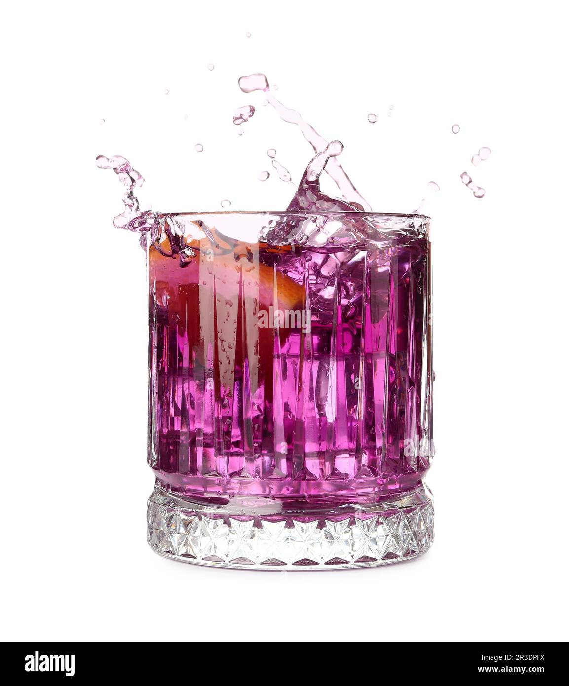 Purple gin and tonic with splashes on white background Stock Photo - Alamy