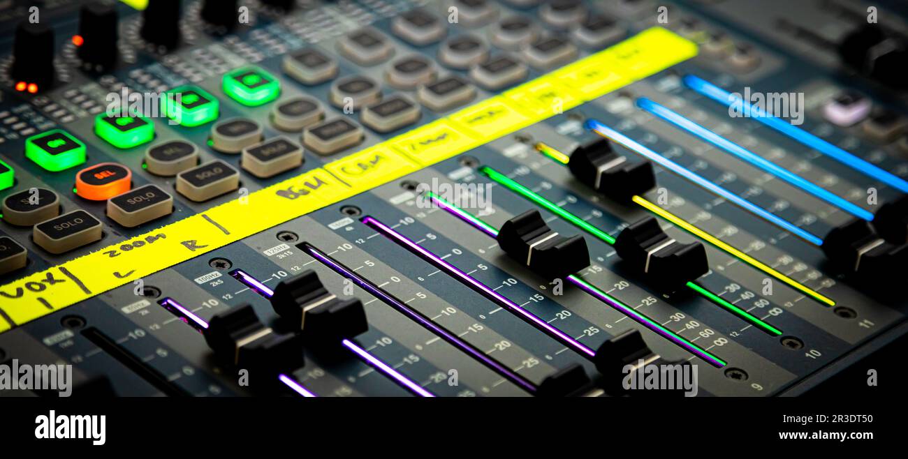 Sliders and buttons on Audio Mixing Desk at live event Stock Photo - Alamy