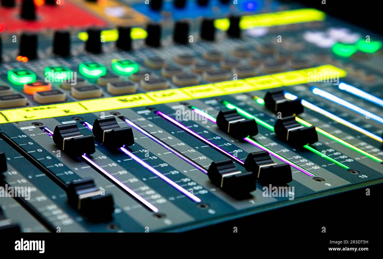 Sliders and buttons on Audio Mixing Desk at live event Stock Photo - Alamy