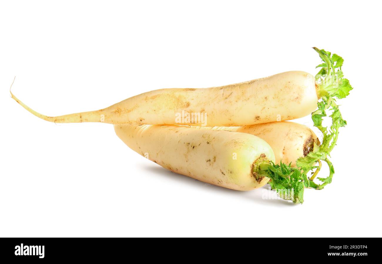 Fresh daikon radishes on white background Stock Photo - Alamy