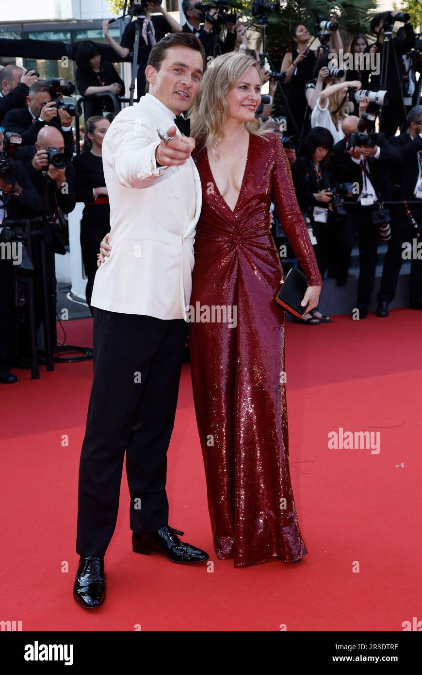 Rupert Friend, left, and Aimee Mullins pose for photographers upon ...