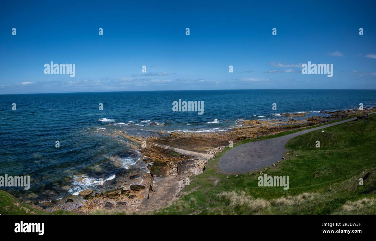 Looking out to the sea from Burgh Head, Moray with the Sutherland hills ...
