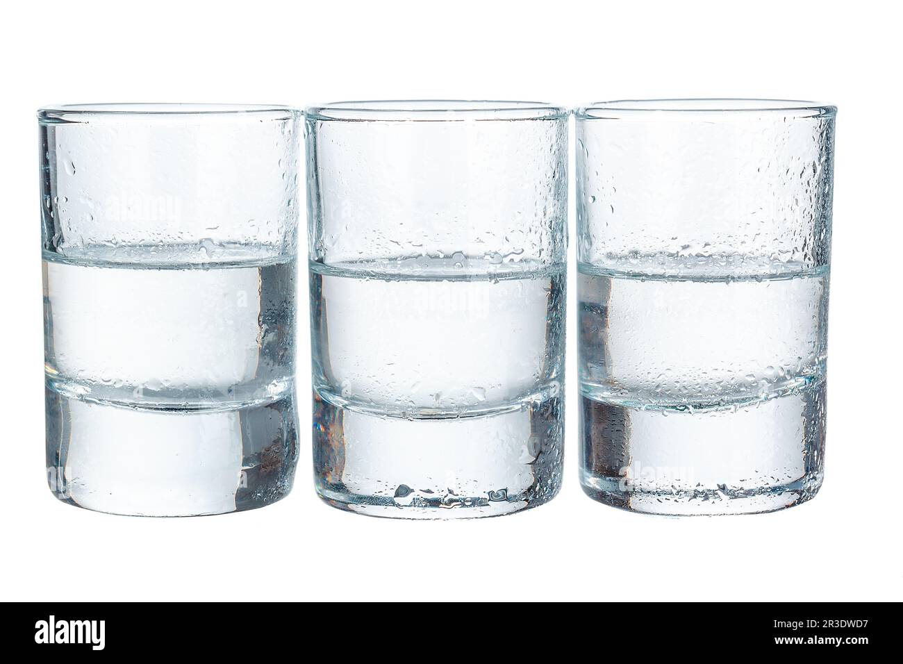 Glass of vodka isolated on white background Stock Photo - Alamy