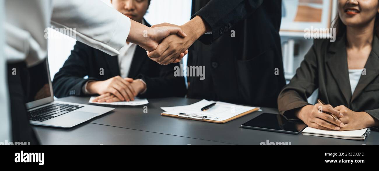 Interviewer handshaking the applicant hi-res stock photography and ...