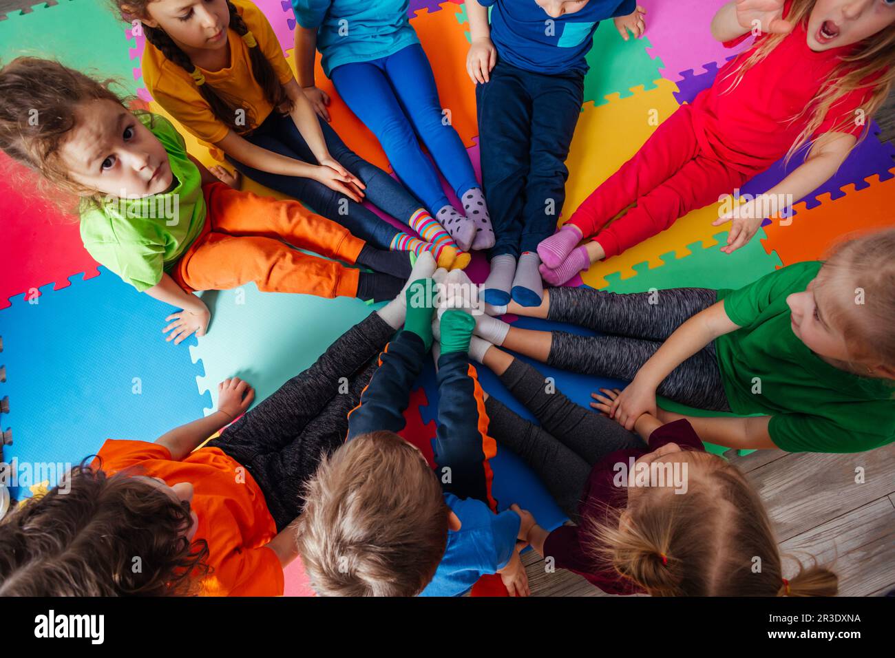 Kids feet circle hi-res stock photography and images - Alamy