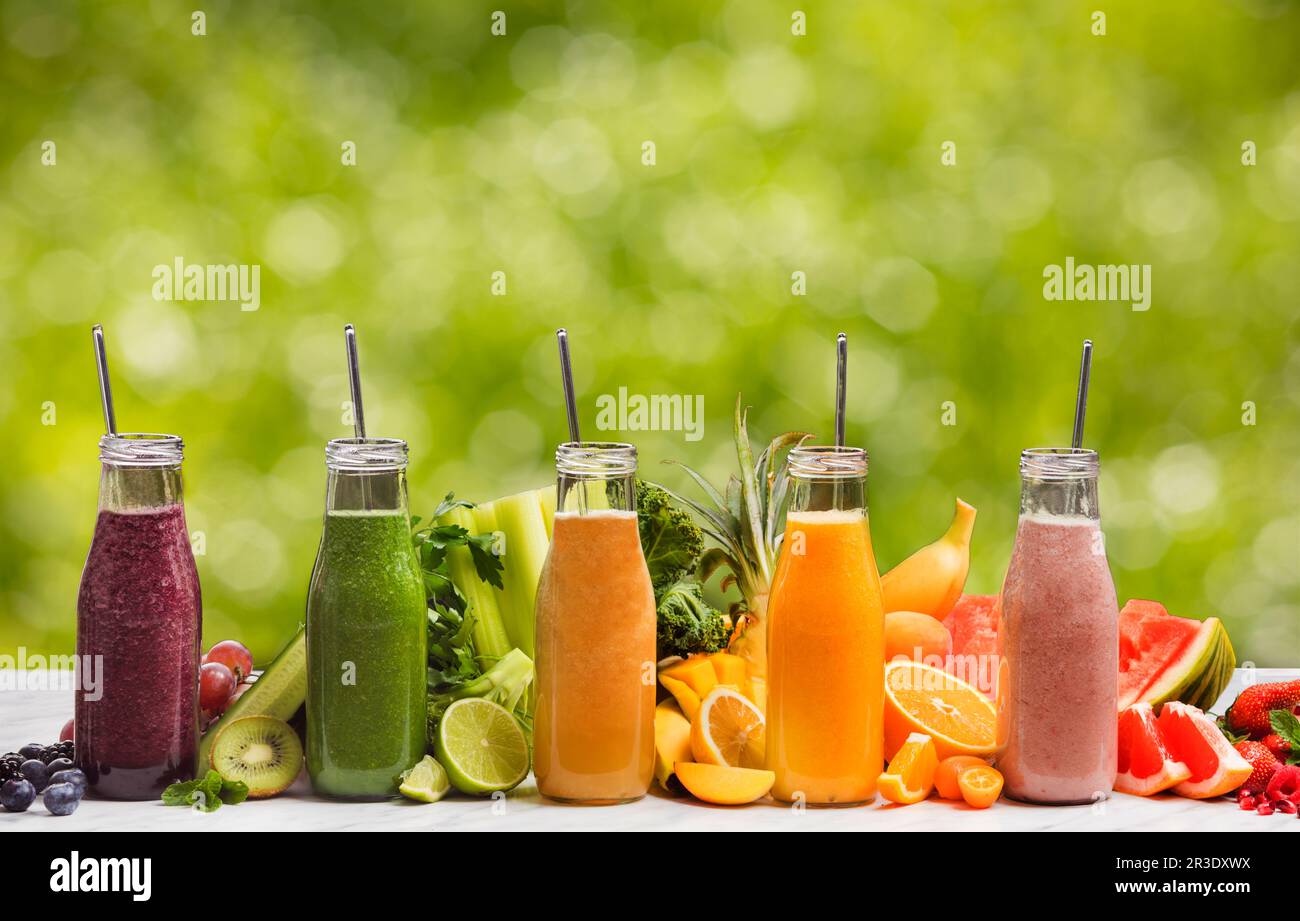 The delicious smoothies with exotic fruits on a white background Stock ...
