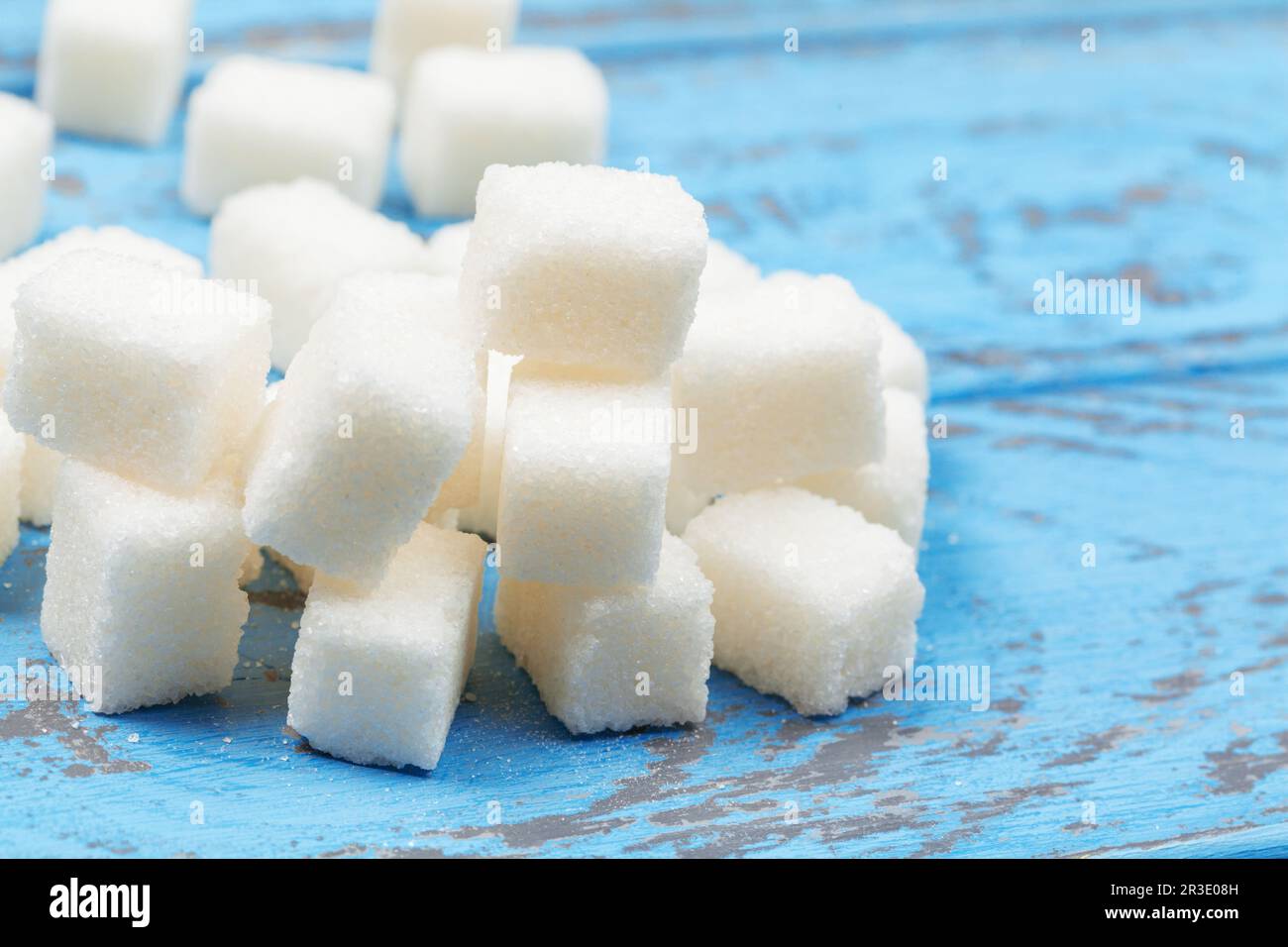 Group of refined white sugar cubes close up Stock Photo - Alamy
