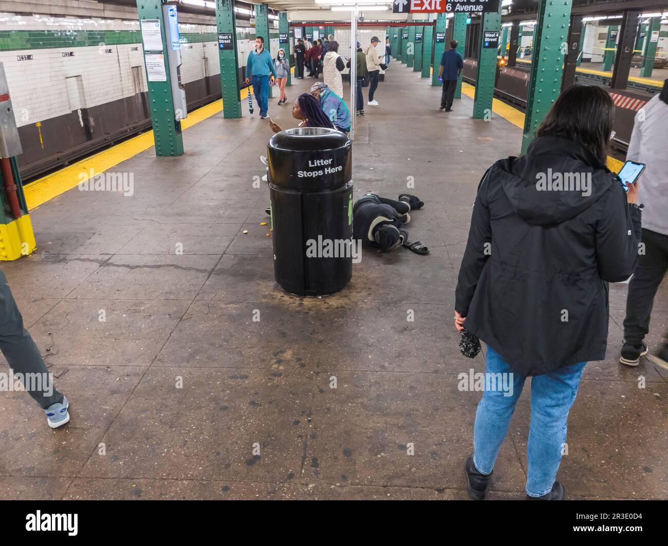 Homeless man sleeping in subway hi-res stock photography and images - Alamy