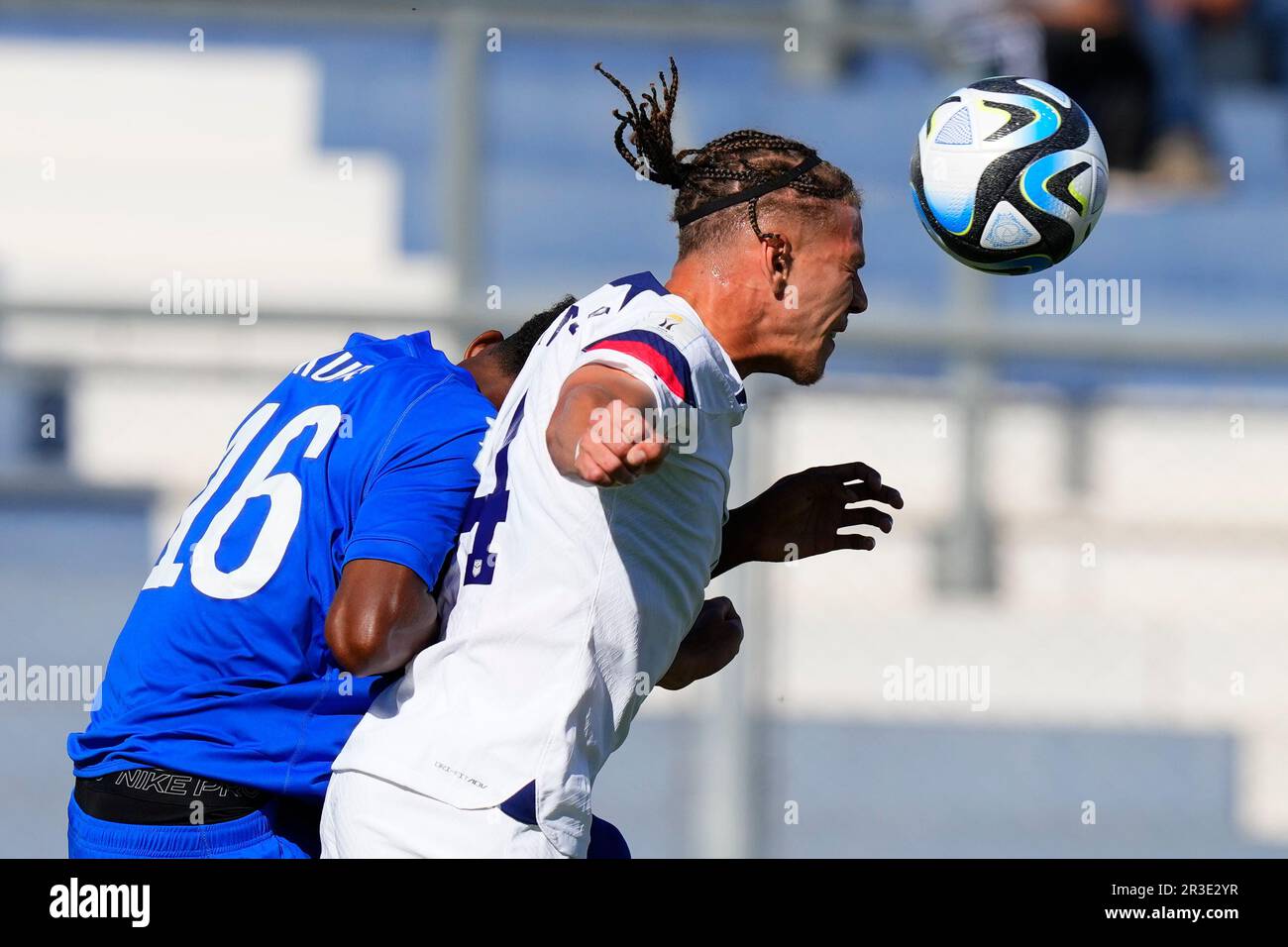 Marcus Ferkranus of the United States, right, and Fiji's Geary Kubu go ...
