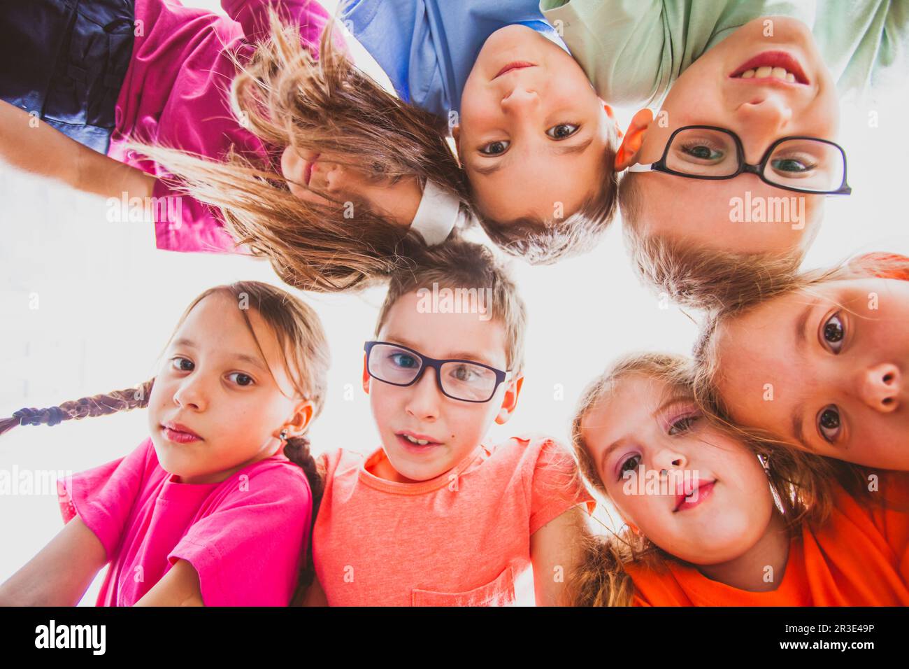 The group of little kids greeting at the camera Stock Photo - Alamy